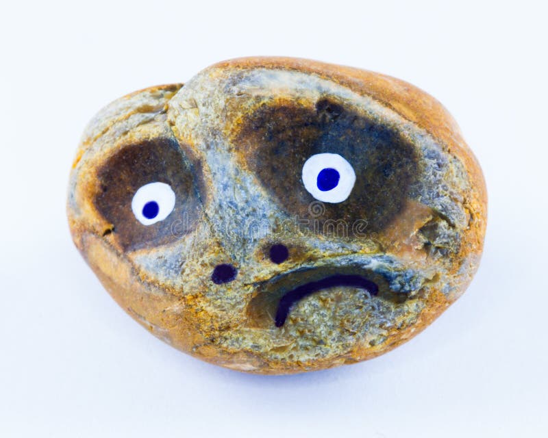 Scared Face Painted on Pebble Stock Photo - Image of painted, pebble ...