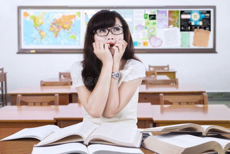 Scared Female Learner Sitting in the Classroom Stock Photo - Image of ...