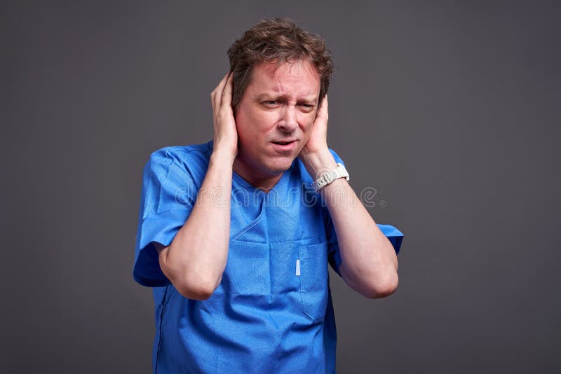 A scared male doctor stock photo. Image of medical, horrified - 80431496