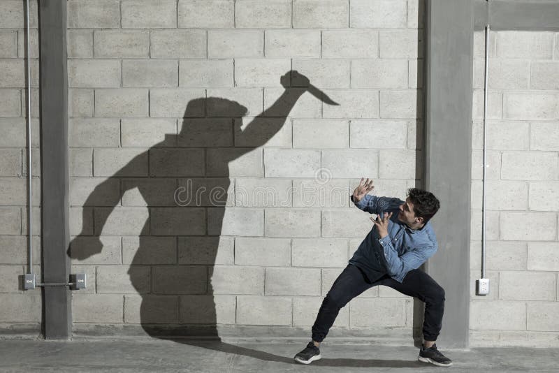 Scared Man by His Own Shadow Stock Photo - Image of evil, indoor: 215372172
