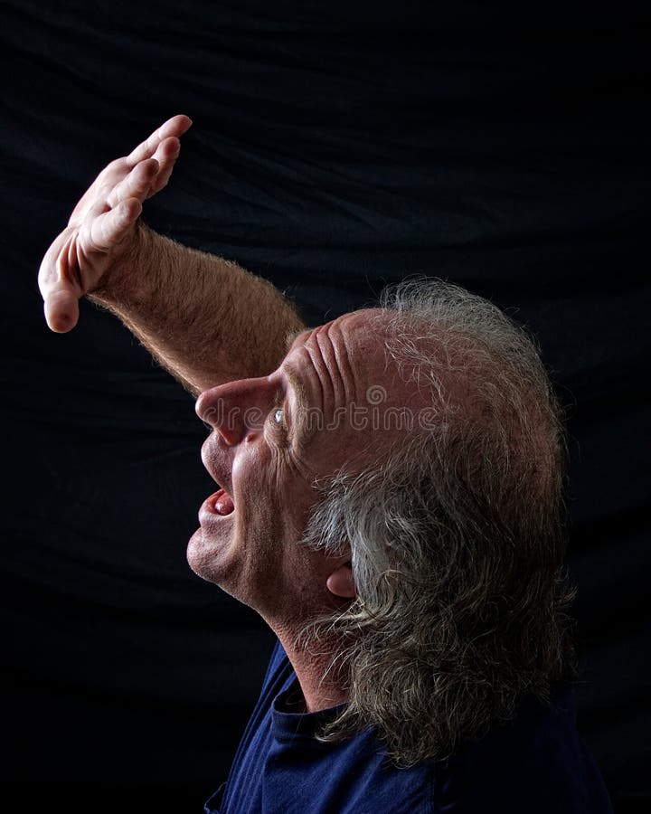 Scared man holding hand up stock image. Image of hand - 21208057