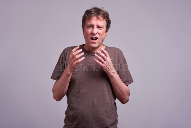 A scared man stock photo. Image of attitude, scare, shock - 80431576