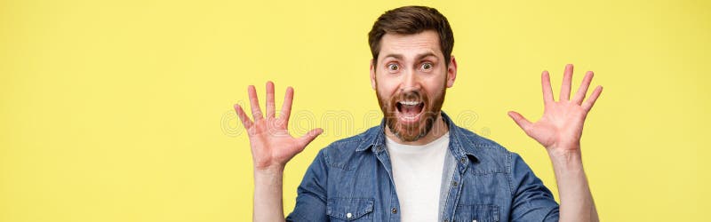 Scared Man with Raised His Hands Up and Shouting Sees Something in ...