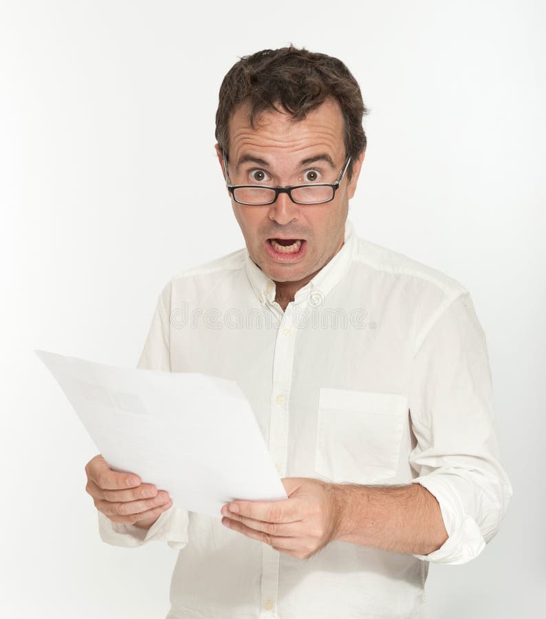Scared Man Reading a Document Stock Photo - Image of shock, reading ...