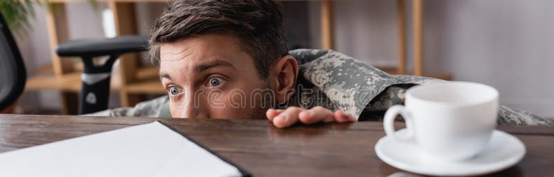 Scared Military Man Hiding Under Desk Stock Image - Image of service ...