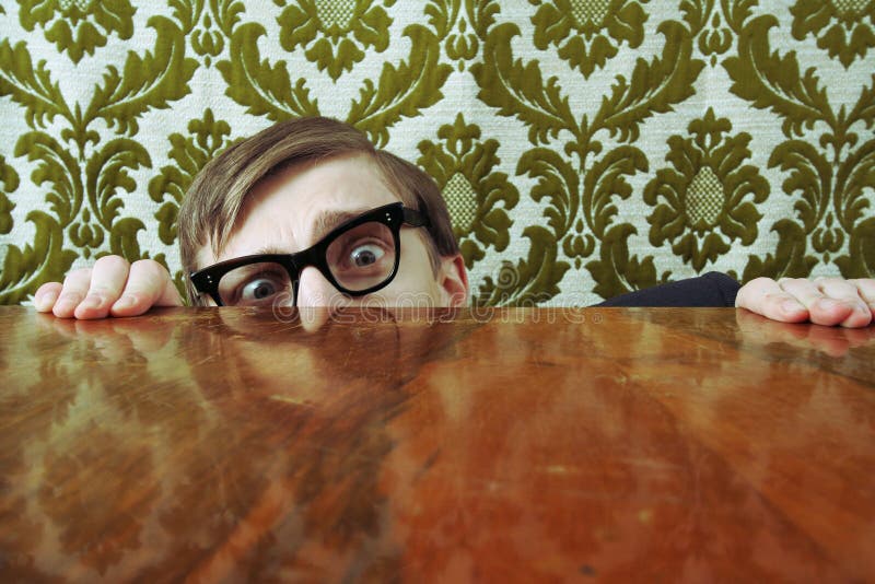 Scared nerd stock image. Image of humorous, desk, glasses - 7595427