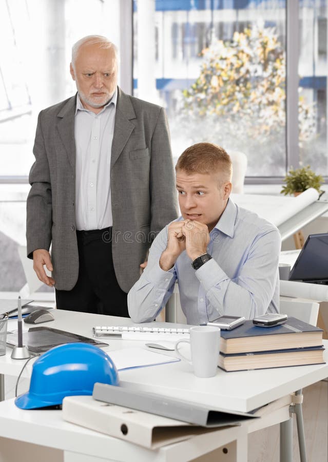 Scared Office Worker with Angry Executive Stock Photo - Image of casual ...