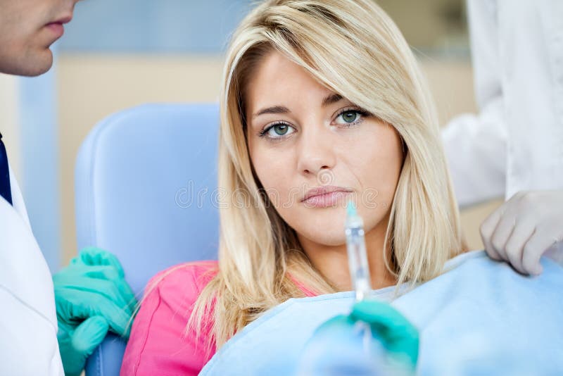 Scared Patient Looking at Injection Stock Photo - Image of anesthetic ...