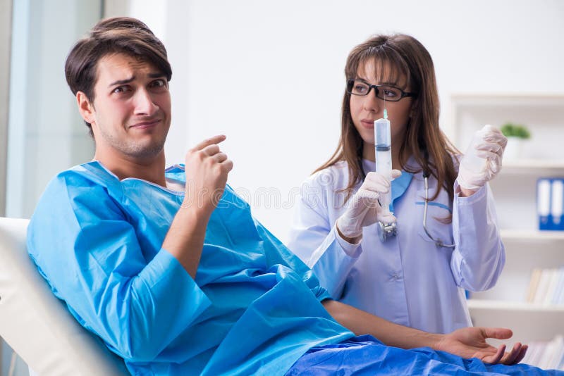 The Scared Patient Man Getting Ready for Flu Shot Stock Photo - Image ...