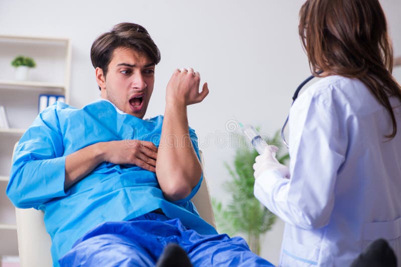 Patient Screaming Doctor Injecting Inoculation Stock Photos - Free ...