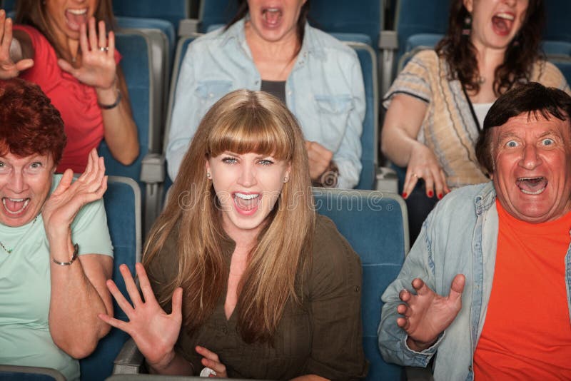 Scared People in Audience stock photo. Image of chairs - 23915340