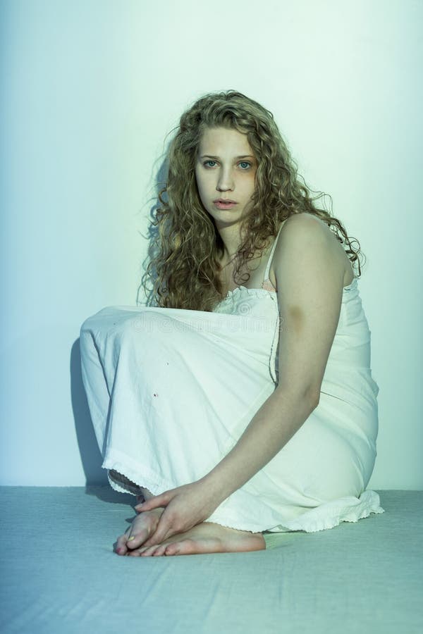 Scared victim stock image. Image of curled, floor, girl - 57092207