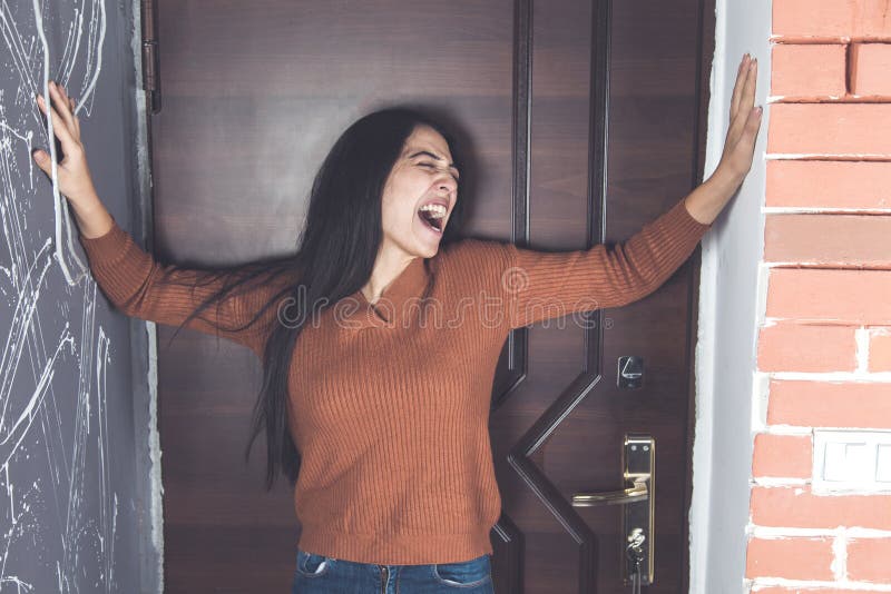 Scared and screaming woman stock image. Image of terrified - 182046487