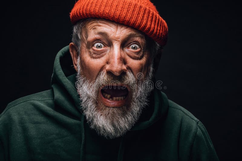 Scared Shocked Bearded Old Man Stares at Camera with Open Mouth, Bugged ... Scared Shocked Bearded Old Man Stares at Camera with Open Mouth, Bugged ...
