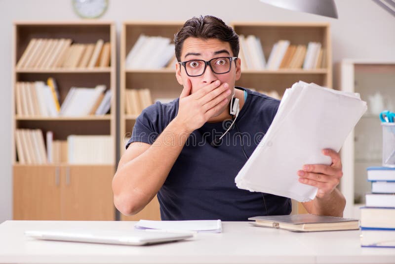 The Scared Student with Paperwork in Library Stock Image - Image of ...