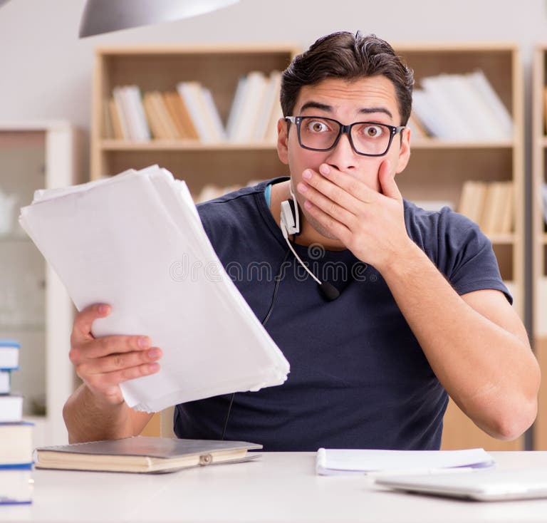 Scared Student with Paperwork in Library Stock Photo - Image of books ...