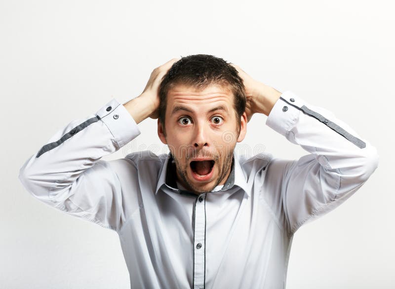 Scared and surprised man stock photo. Image of hands - 101421016