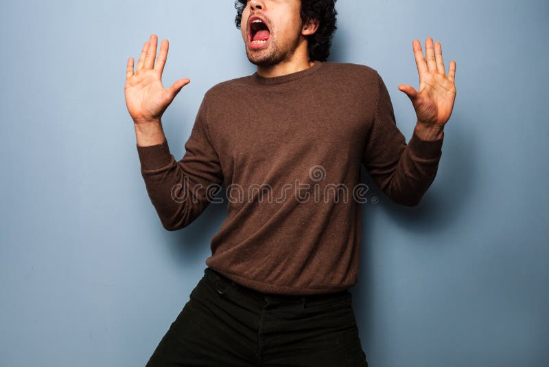 Scared and Surprised Young Man Stock Photo - Image of ethnic, startled ...