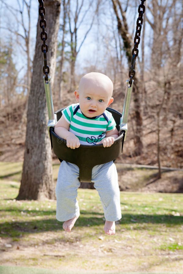 Scared Swinging Baby stock image. Image of child, park - 48242781