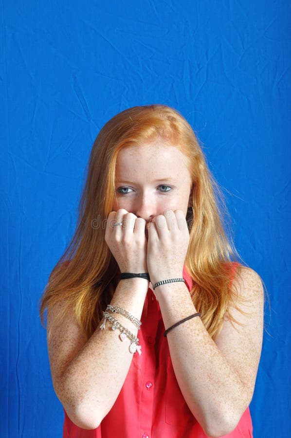 Scared Teen On Blue Background Stock Image - Image of eccentricity ...