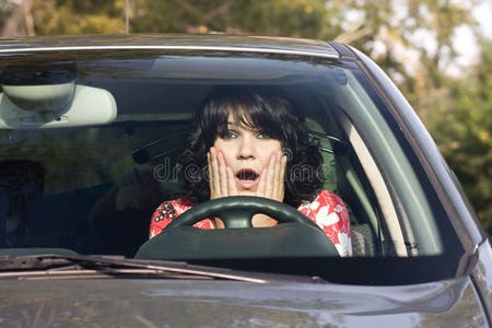 Scared woman in a car stock image. Image of scared, opened - 10847937