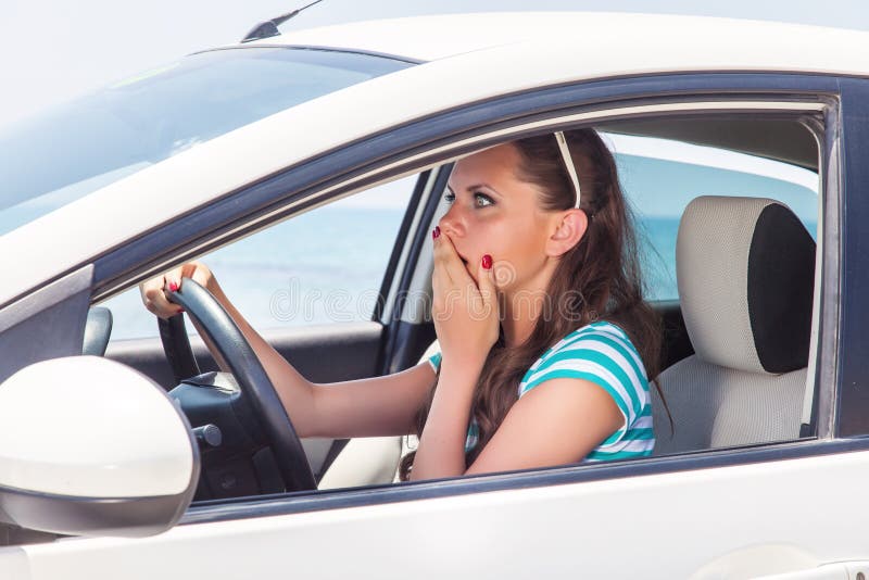 A Scared Woman is in the Car Stock Photo - Image of beautiful ...