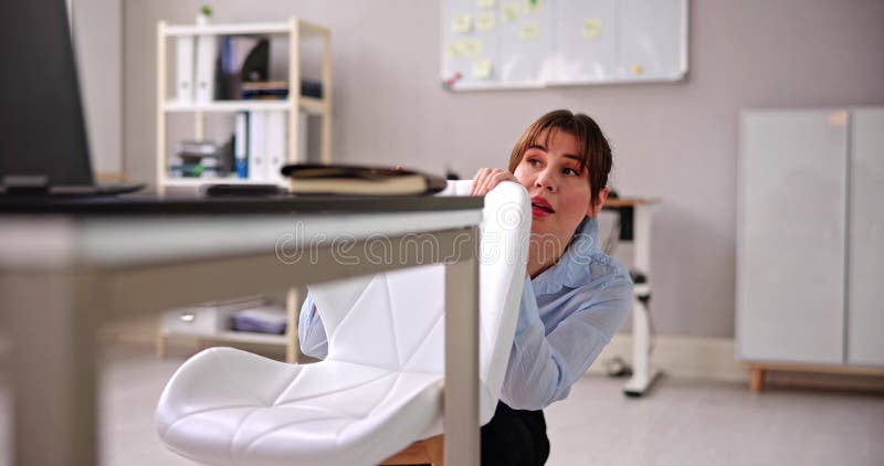 Scared Woman Hiding Behind Chair Stock Photo - Image of lady, looking ...