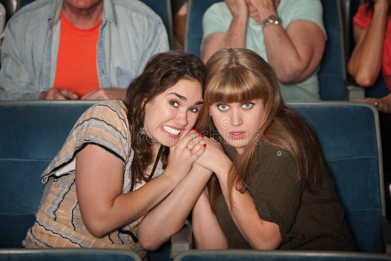 Scared Women in Theater stock photo. Image of entertainment - 22448428