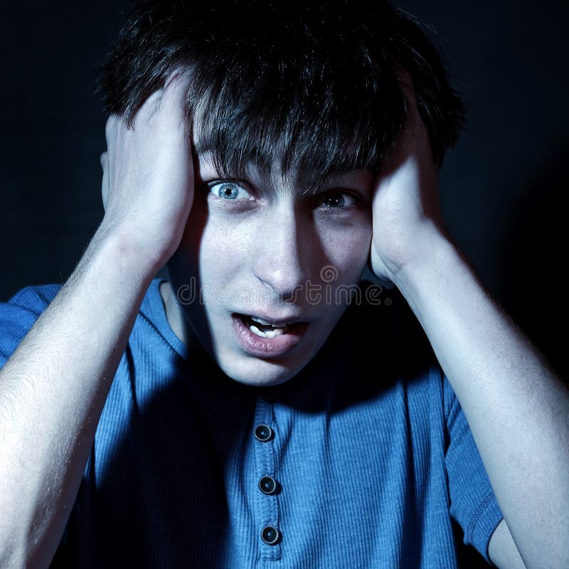 Scared Young Man stock photo. Image of fearful, fear - 65312610