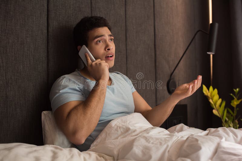 Scared Young Mixed Race Man Talking Stock Photo - Image of stressed ...