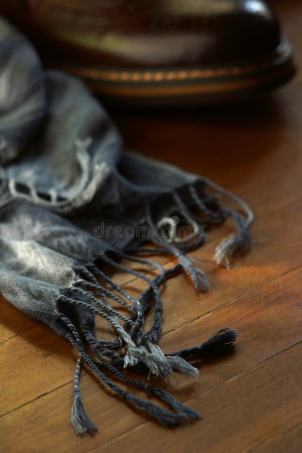 Scarf on the floor stock image. Image of gray, still - 66576567