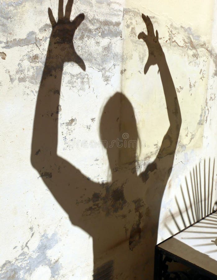 A scaring shadow stock image. Image of wall, menacing - 207885615