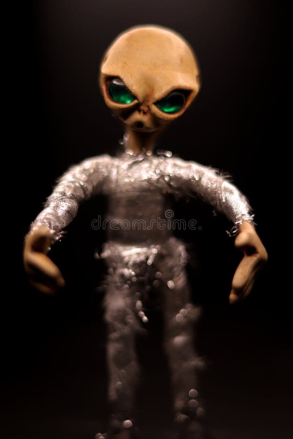 Scary Alien from Clay on Dark Background Stock Photo - Image of bokeh ...