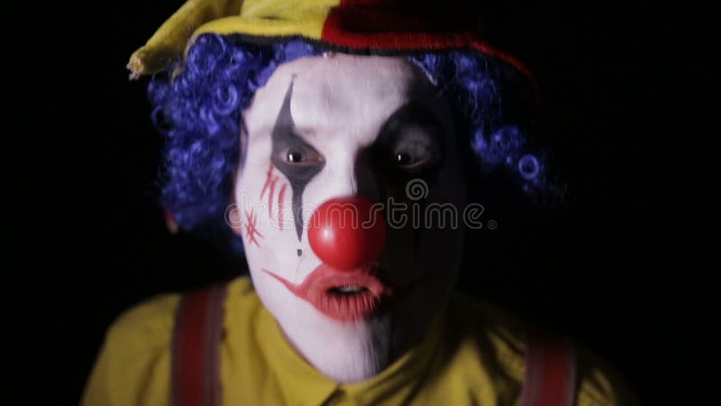 Scary Clown Screaming into Camera Faces. Close-up Stock Footage - Video ...