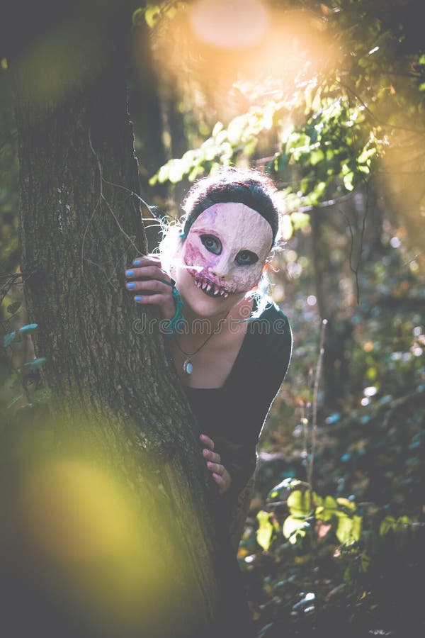 Scary Creature Lurk Behind Tree in the Forest Stock Photo - Image of ...