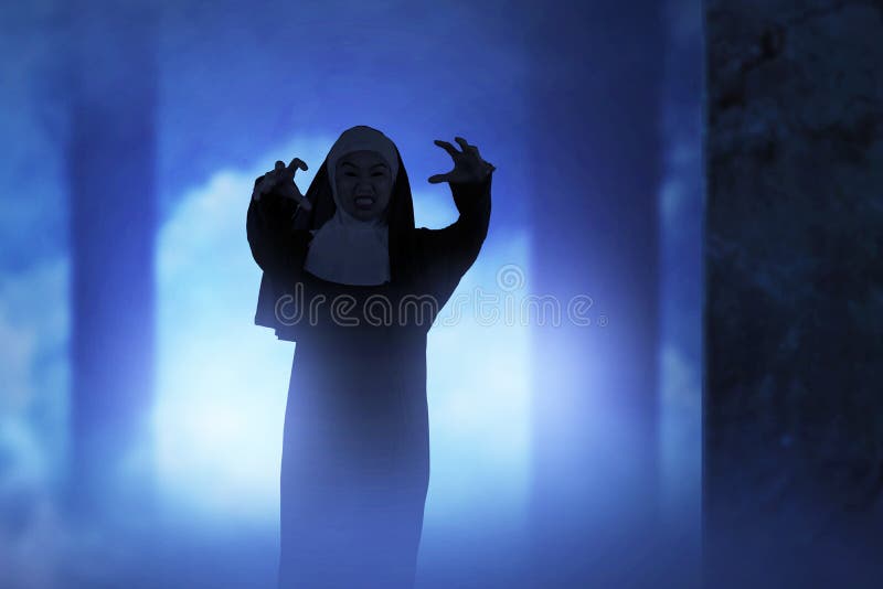 Scary Devil Nun Standing in the Abandoned Building Stock Photo - Image ...