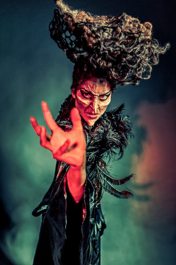 Scary Witch Casting a Spell Stock Photo - Image of magician, fear ...