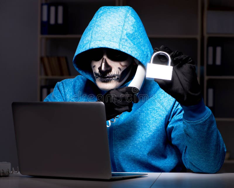 The Scary Hacker Hacking Security Firewall Late in Office Stock Photo ...