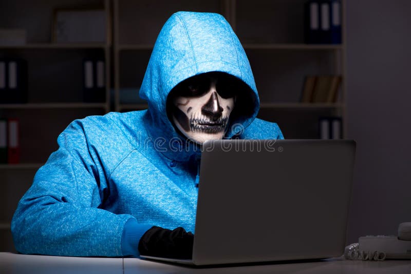 The Scary Hacker Hacking Security Firewall Late in Office Stock Photo ...