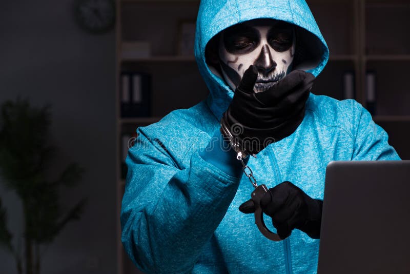 The Scary Hacker Hacking Security Firewall Late in Office Stock Photo ...
