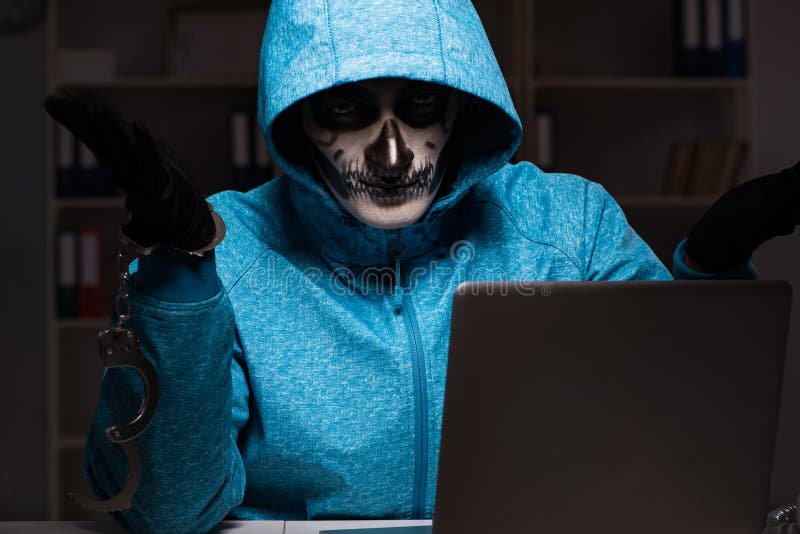 The Scary Hacker Hacking Security Firewall Late in Office Stock Photo ...