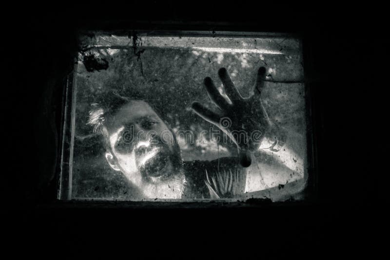 Scary Man Behind Window with Spider Nets at Night Halloween Horror ...