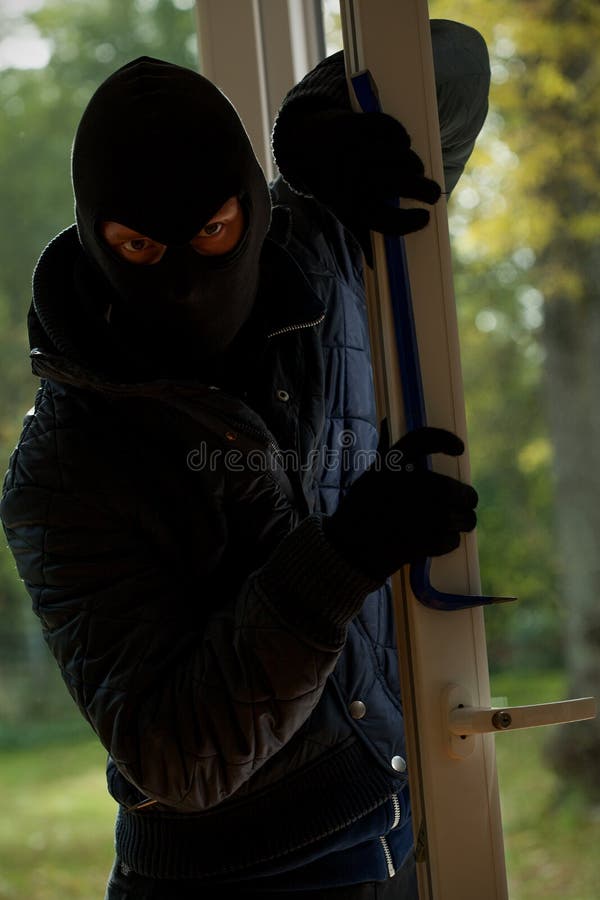 Scary masked burglar stock photo. Image of risk, breakin - 37686664