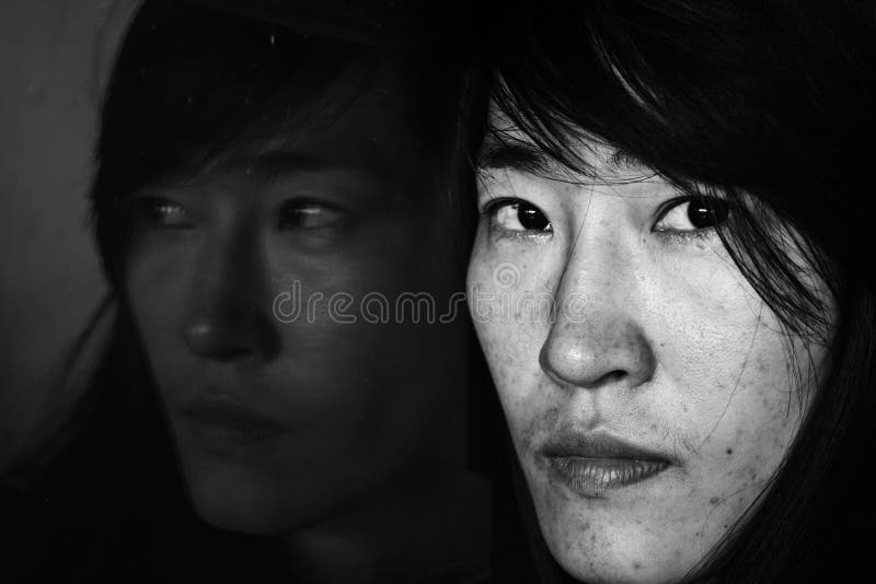 Scary Woman Looking on Camera with Reflection on Mirror Stock Photo ...