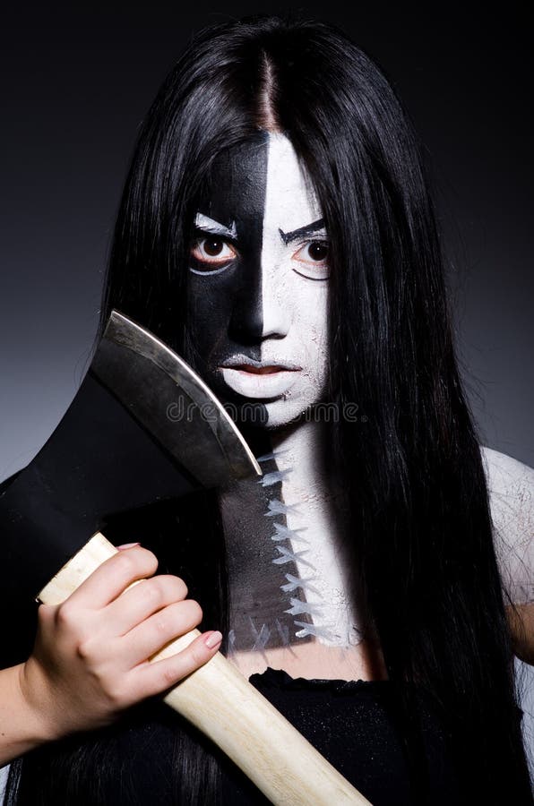 Scary woman with metal axe stock photo. Image of isolated - 44752554