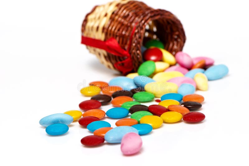 Candies Spilling Out of a Basket Stock Photo - Image of spilling ...
