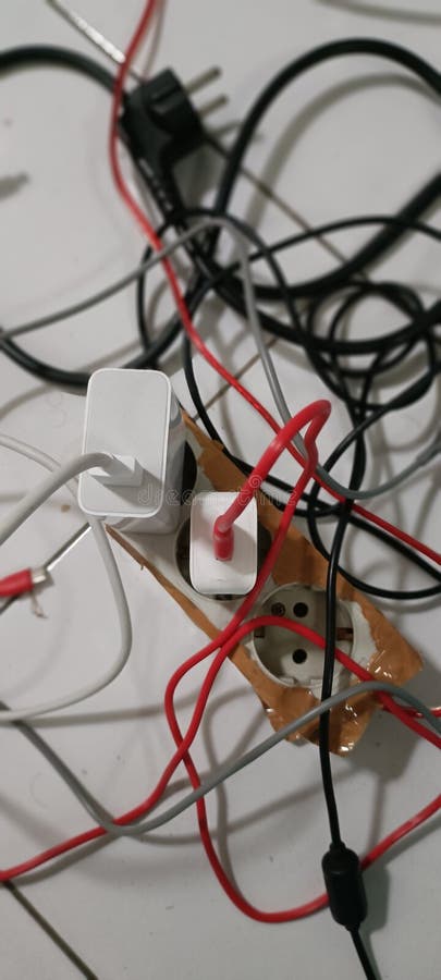 Scattered charger cables stock photo. Image of multimedia - 240816388