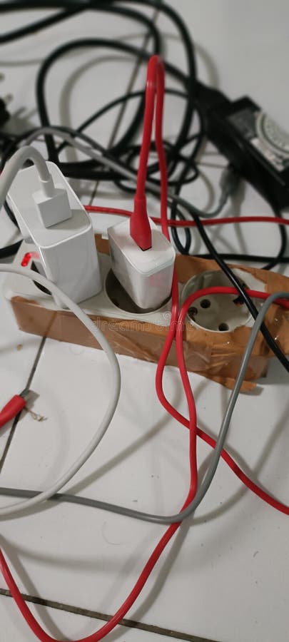 Scattered charger cables stock photo. Image of glasses - 240816314