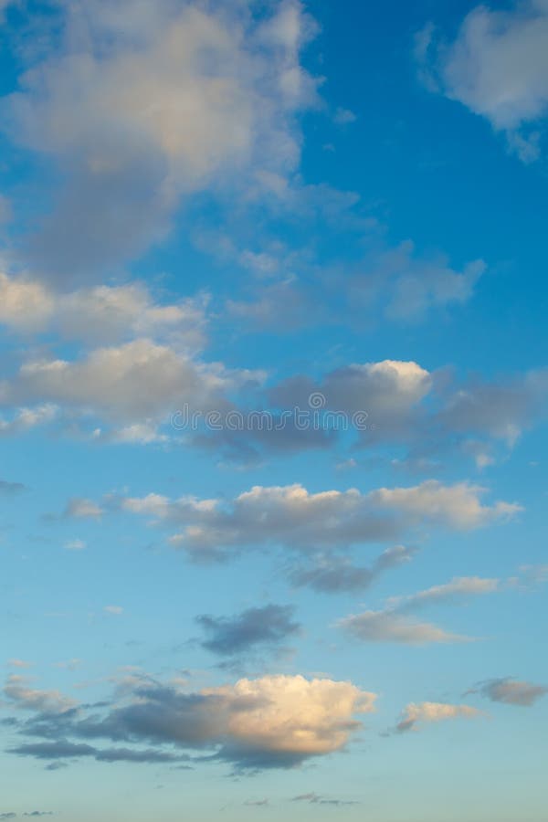 Scattered Clouds in a Blue Sky at Dusk Stock Image - Image of horizon ...