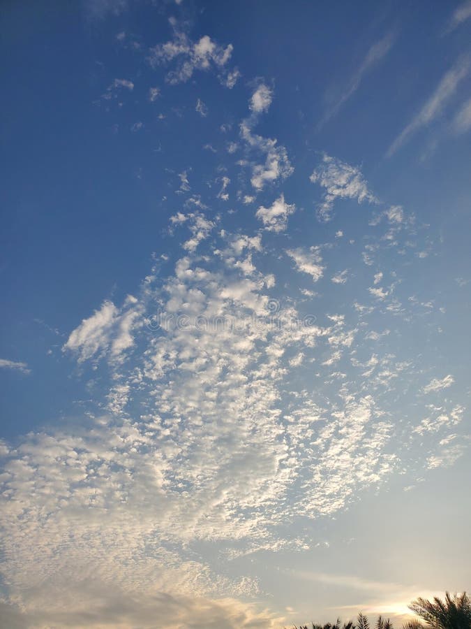 Scattered Clouds Sky Vertical Stock Photo - Image of sunlight, morning ...